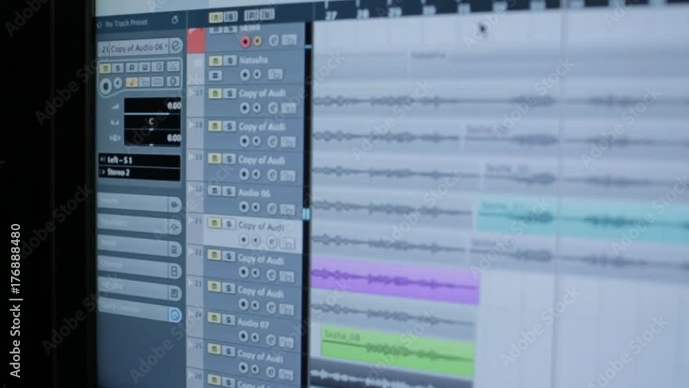 Composer working on new music track in special professional program ...