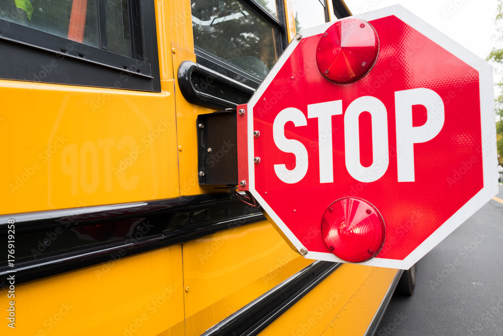 school bus stop sign on side of bus Stock Photo | Adobe Stock