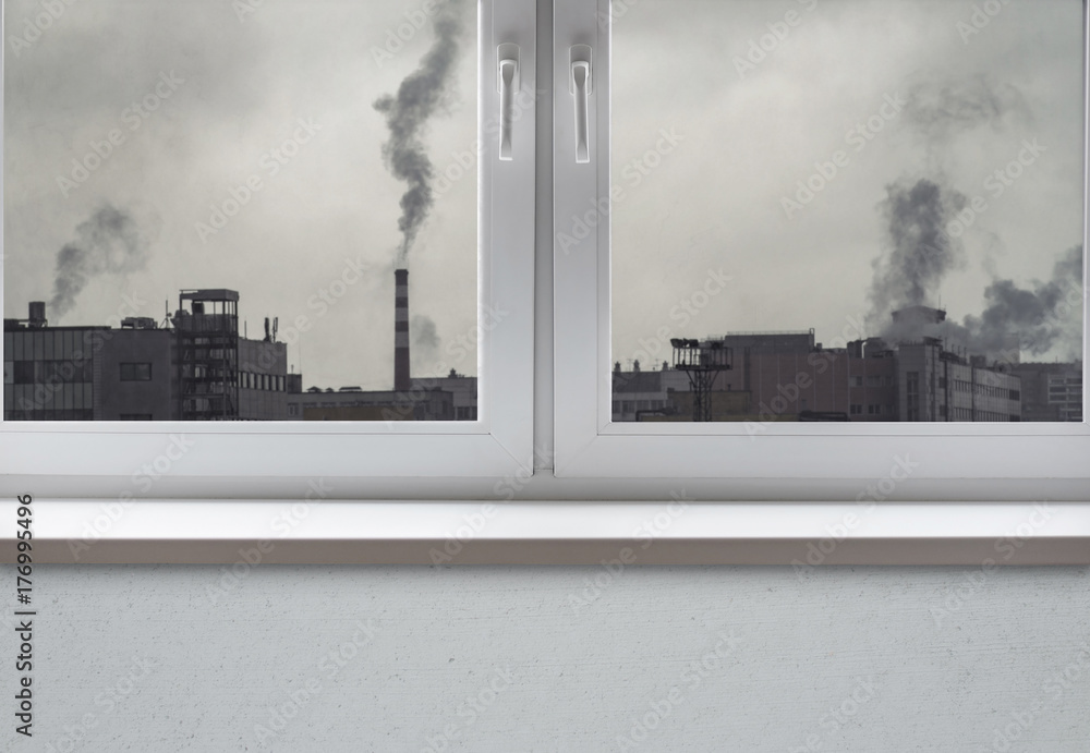 Photo & Art Print Air pollution over the City and clean white window ...