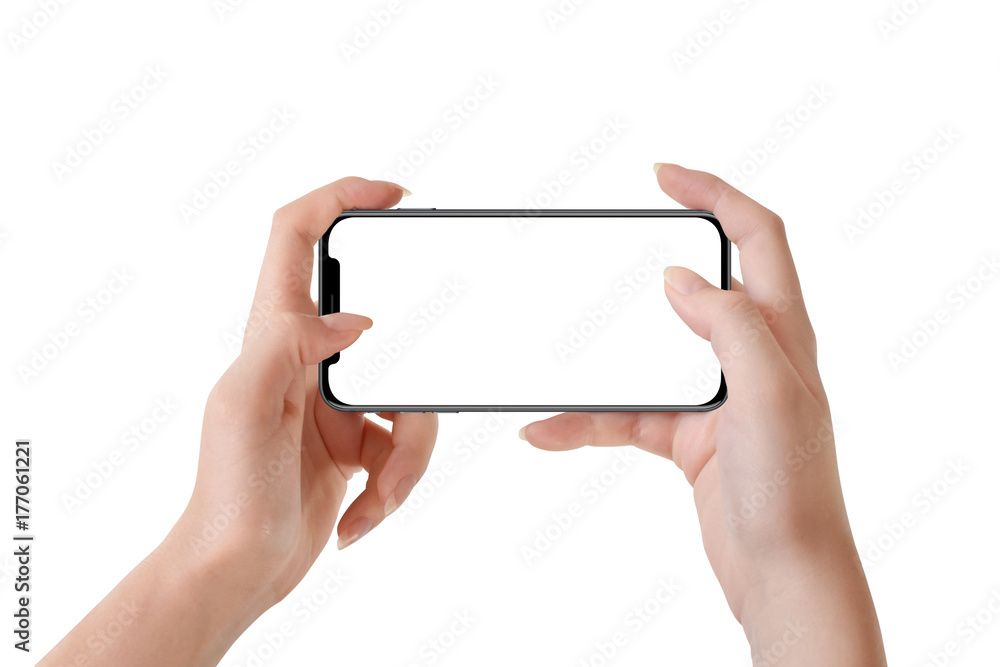 Female hands holding modern black phone in horizontal position ...