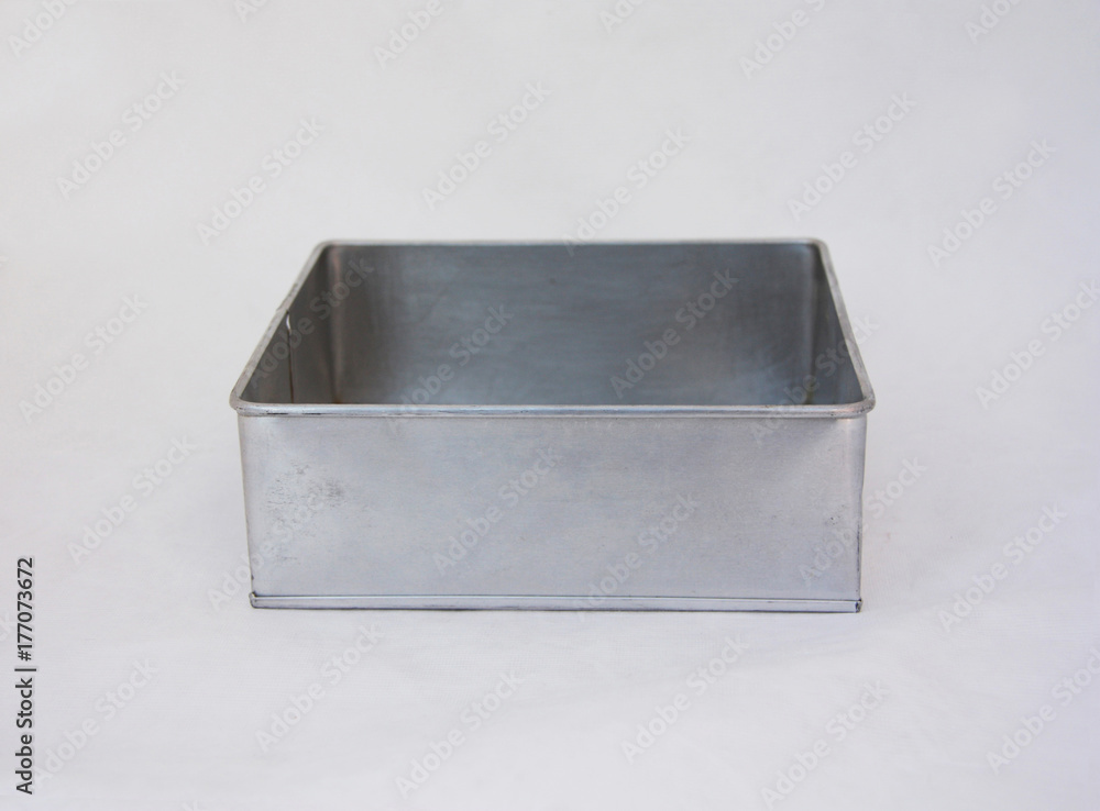Square zinc mold cake on the white background. Metal archetype of cake ...