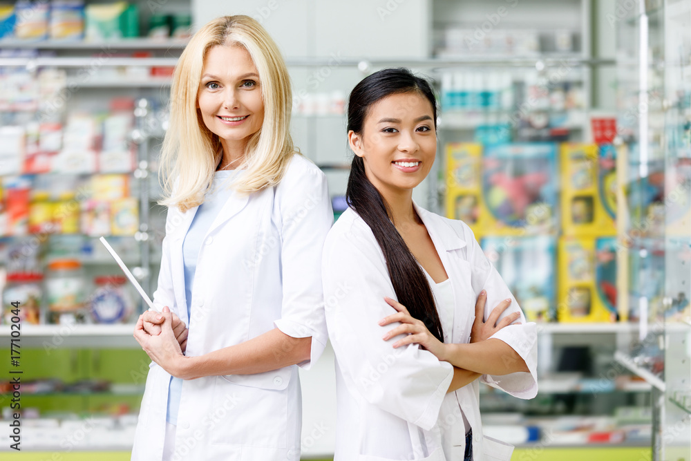 multiethnic pharmacists in drugstore Stock Photo | Adobe Stock