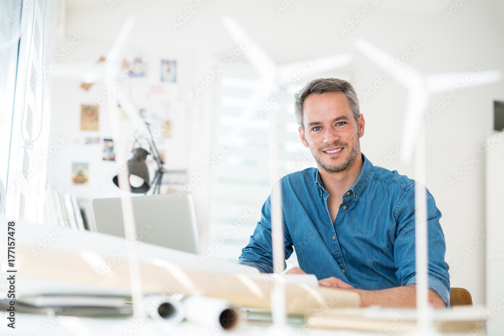 Architect working on an ecological construction project Stock Photo ...