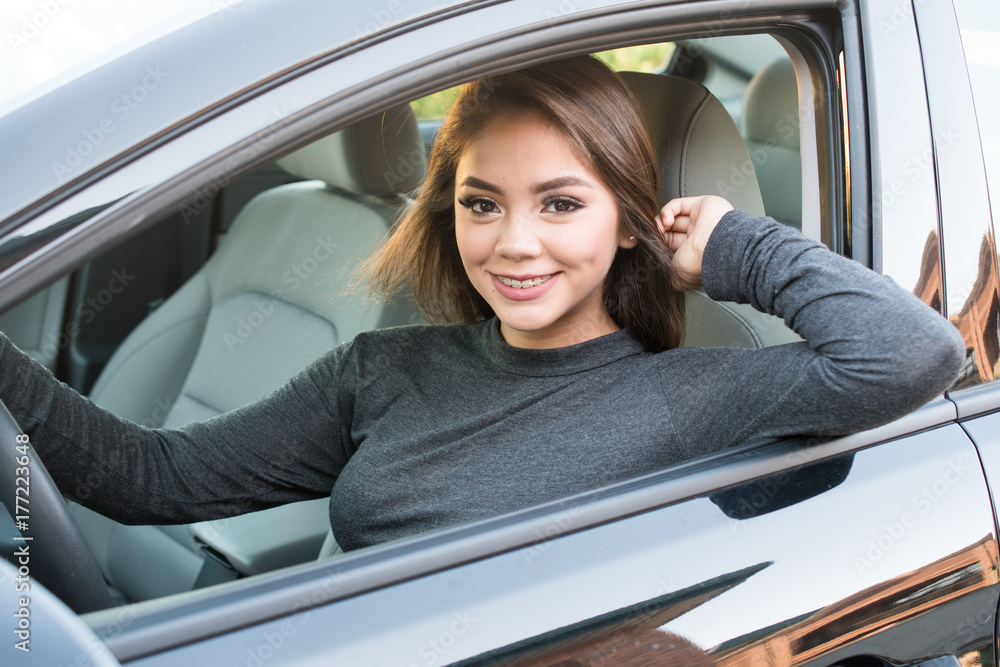 Teen Girl Driving Car Stock Photo | Adobe Stock