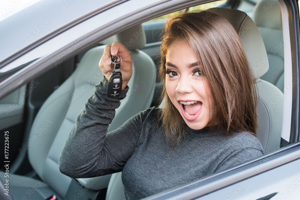 Teen Girl Driving Car Stock Photo | Adobe Stock