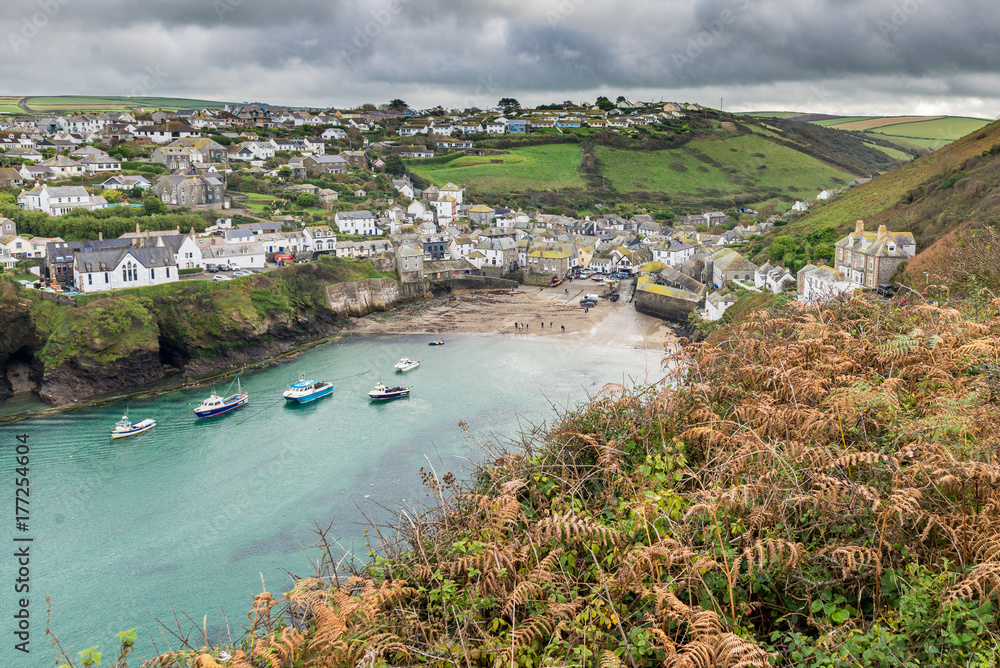 Port Isaac is a pretty fishing village that is used as the filming ...