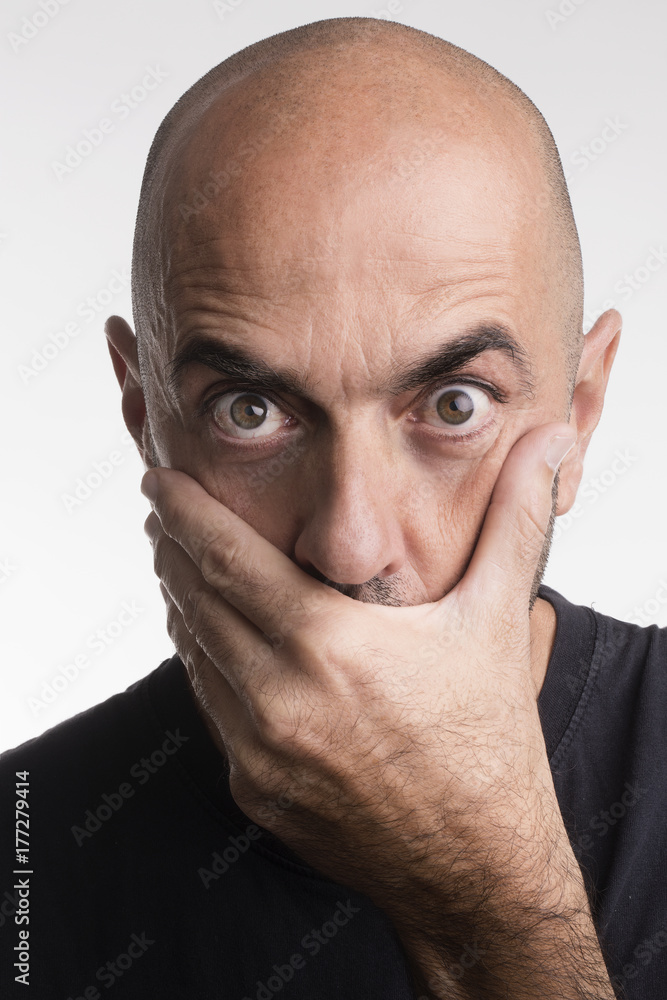 Smorfia con mano sul volto Stock-Foto | Adobe Stock