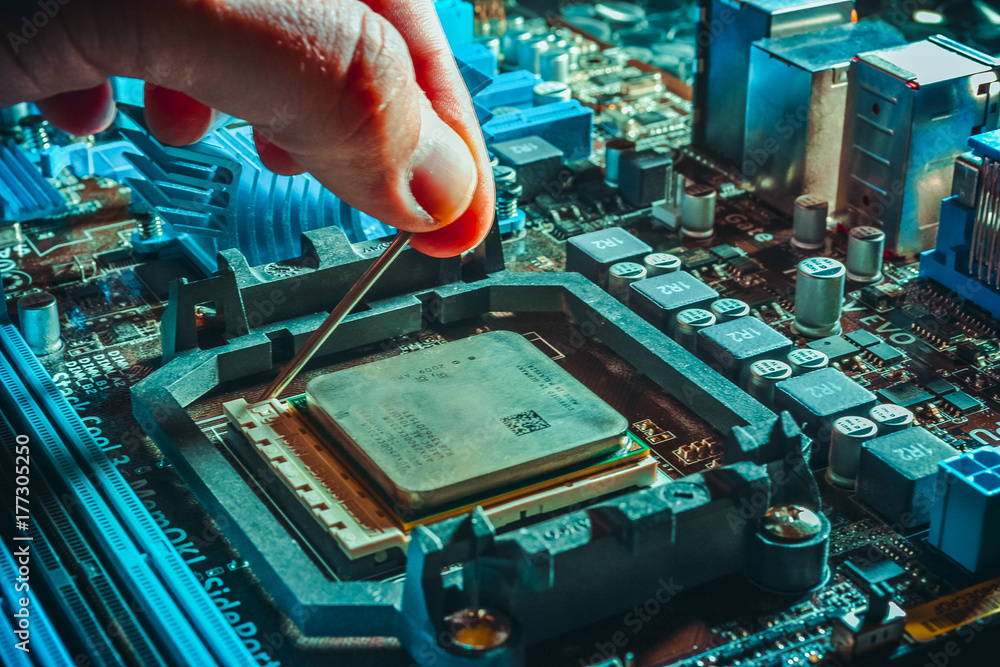 Installing the CPU into the motherboard Stock Photo | Adobe Stock