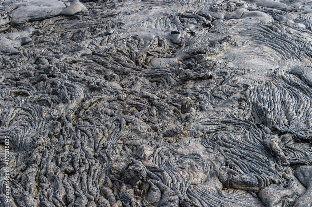 Pahoehoe or rope lava, on Rabida Island, Galapagos. It is formed of ...