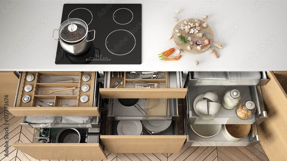 Opened wooden kitchen drawer with accessories inside, solution for ...