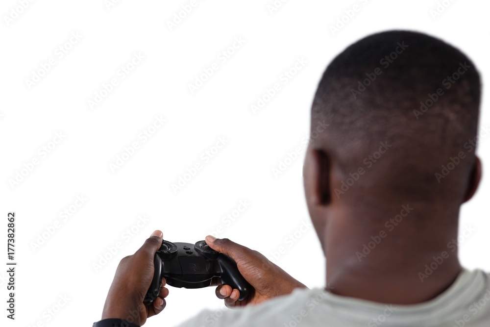 Man playing video game against white background Stock Photo | Adobe Stock