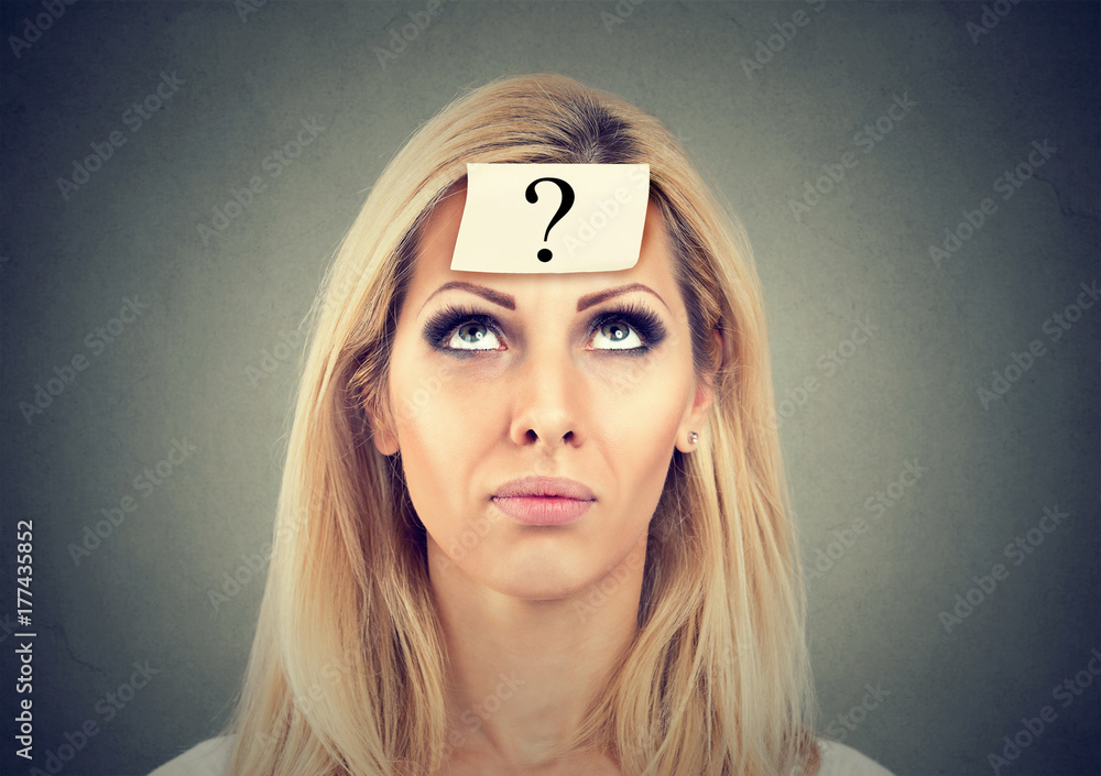 thinking woman with question mark looking up Stock Photo | Adobe Stock