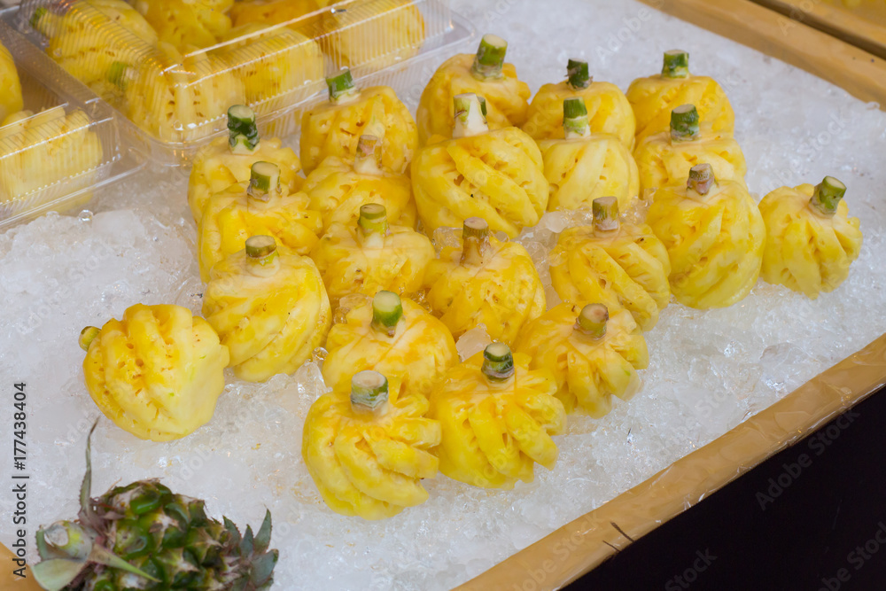 Chiangrai Phulae Pineapple soaked in ice. A small pineapple. sweet ...