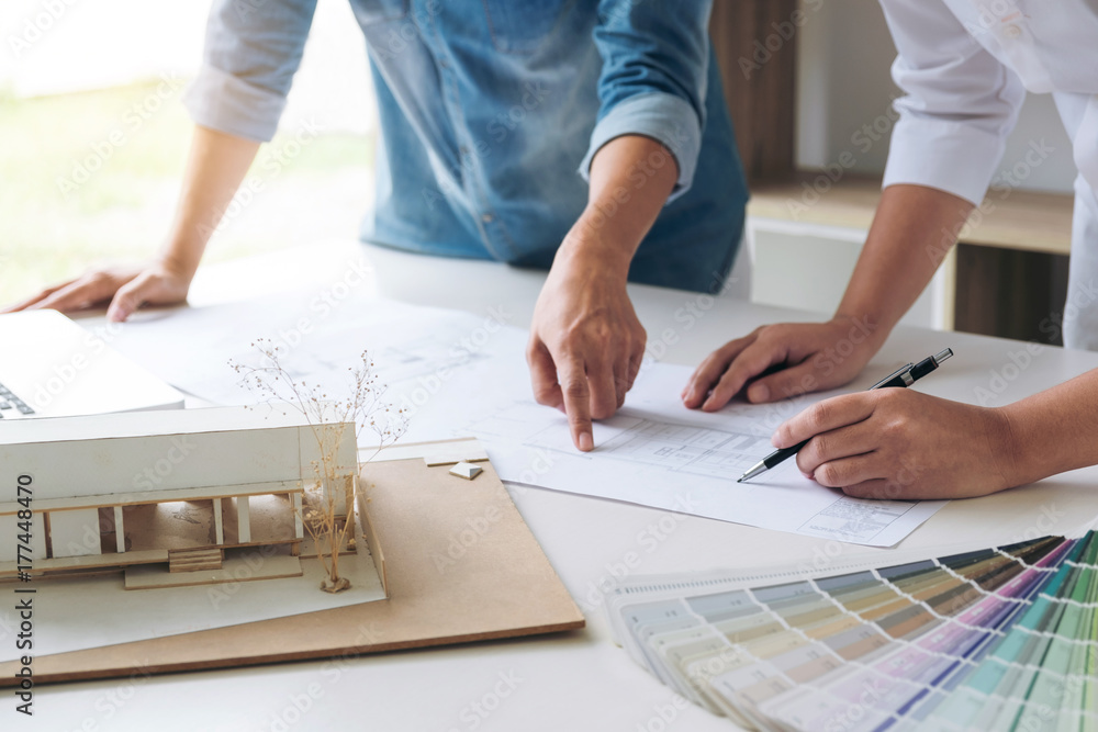 Two interior design or graphic designer at work on project of ...