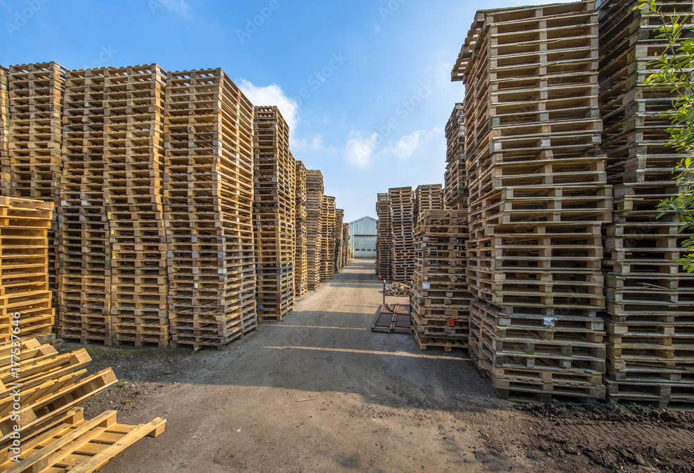 Business area with huge piles of cargo pallets Stock Photo | Adobe Stock