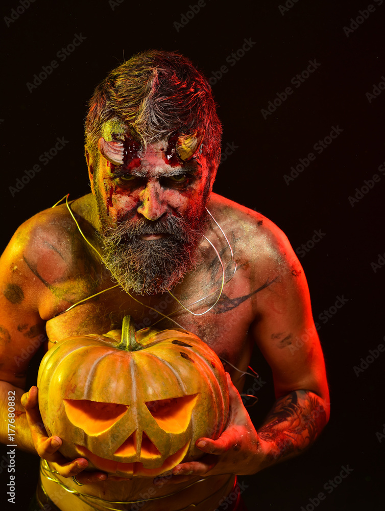 Halloween satan stare with bloody horns, beard, red blood, wounds Stock ...