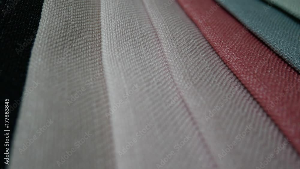 Fabric Samples Of Different Colors In Move Are Spinning And Rotation ...