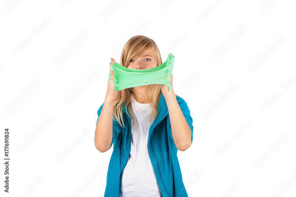 Funny girl holding green slime looks like gunk in front of her face ...
