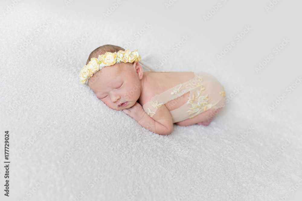 Little baby girl sleeping on her side Stock Photo | Adobe Stock