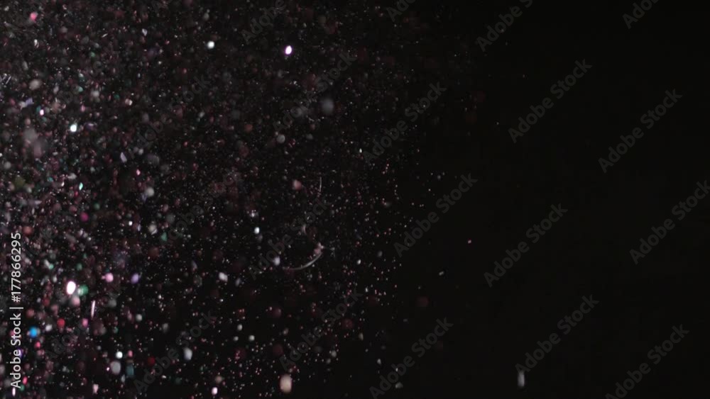 Realistic Glitter Exploding on Black Background. These clips are ...
