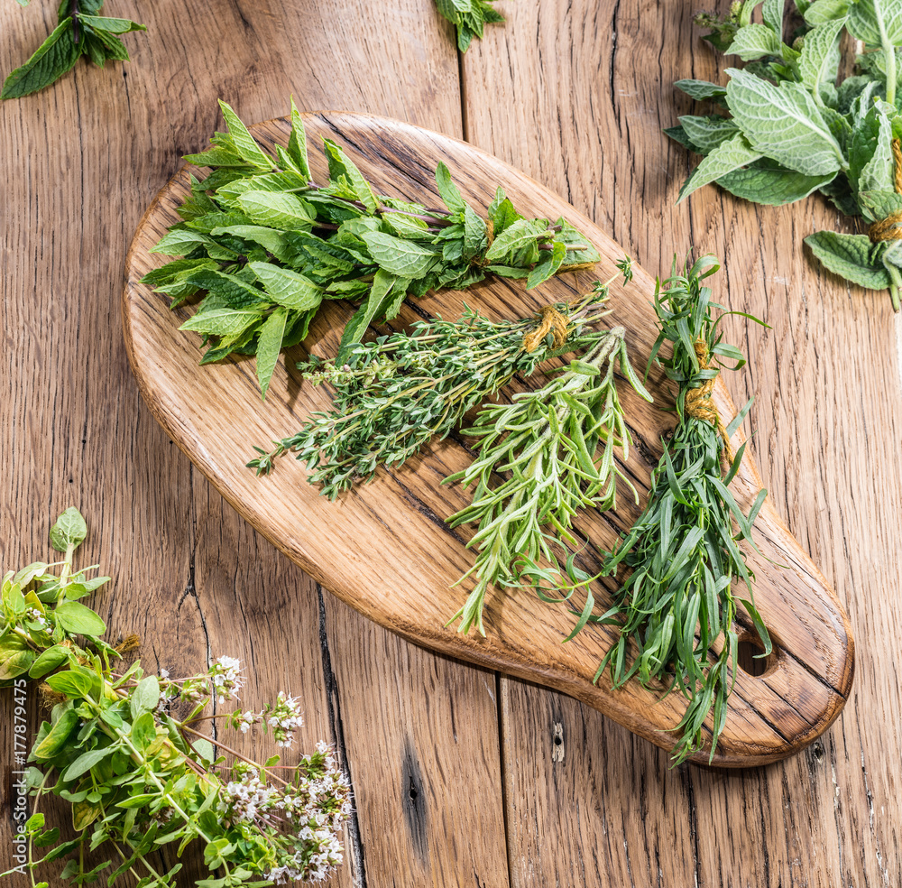 Fresh herbs on the wooden table. Stock Photo | Adobe Stock