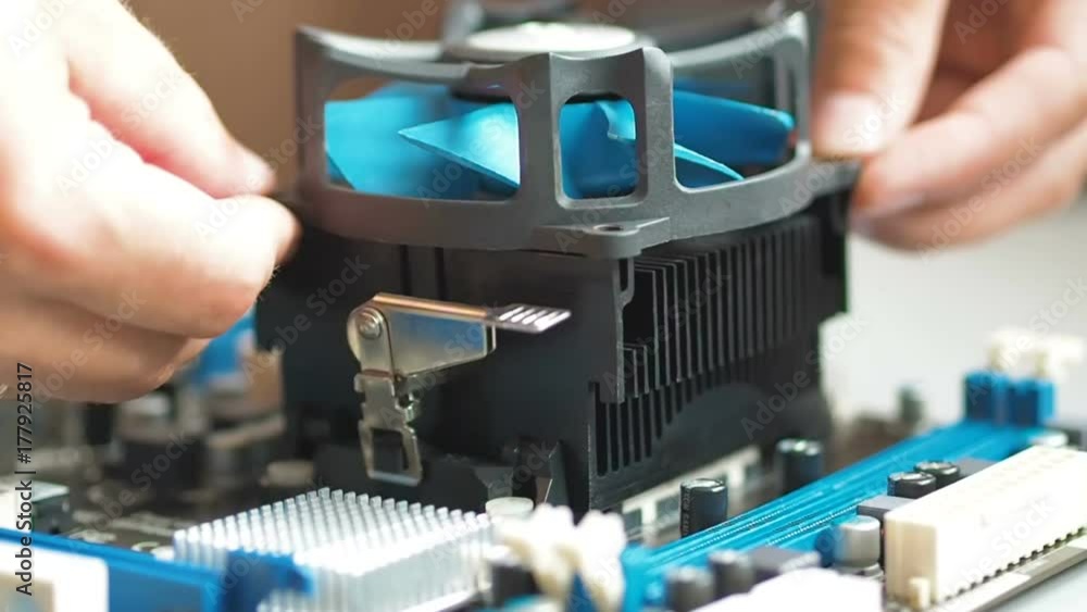 Removing And replacing Fan CPU on the motherboard. Installing and ...