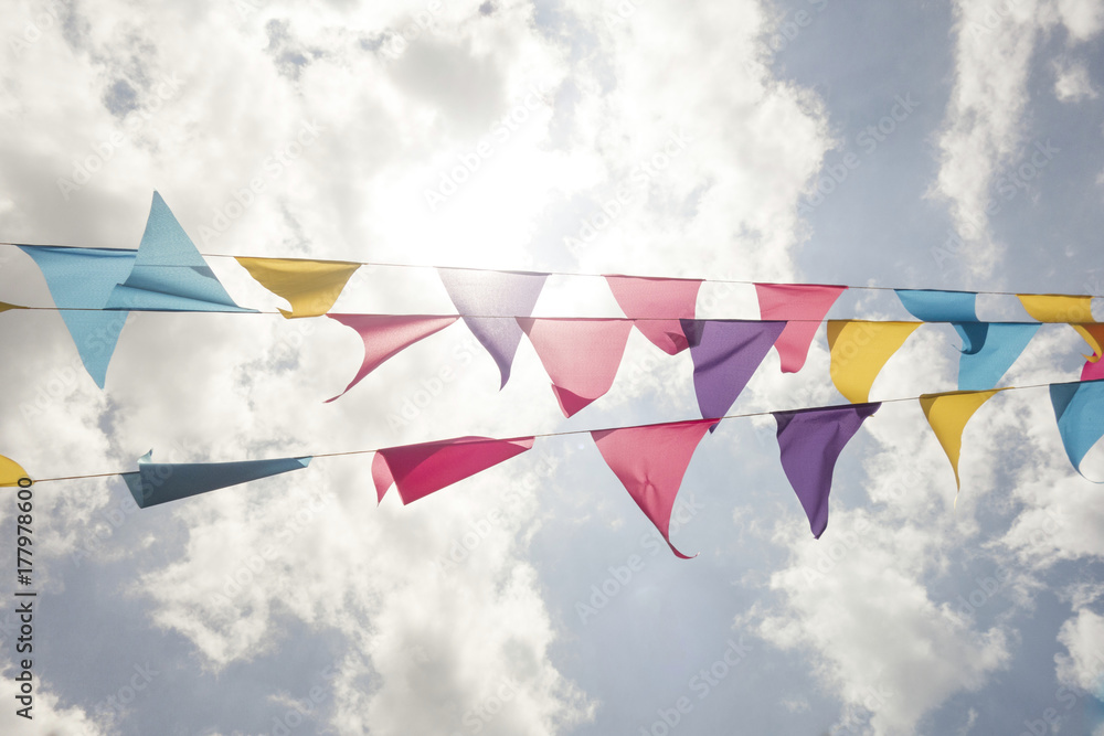 Colorful Triangle Banner Flags Waving in the Wind with Cloud Background ...