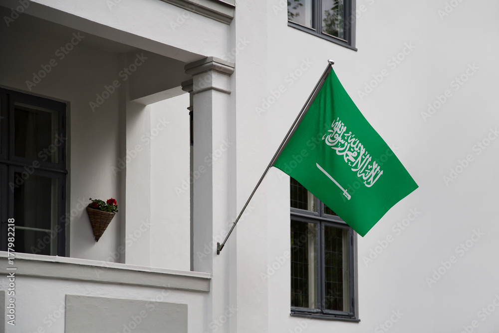 Saudi Arabia flag. Saudi Arabian flag displaying on a pole in front of ...