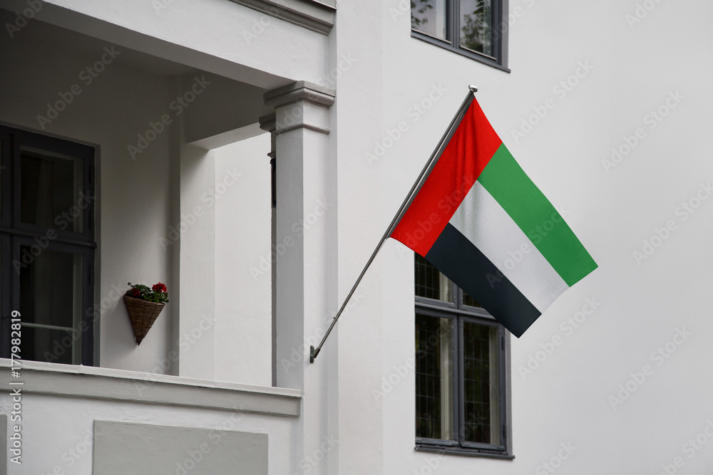 the United Arab Emirates flag. U.A.E. flag displaying on a pole in ...