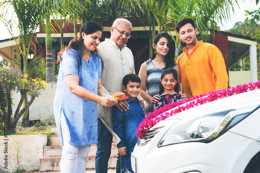 Indian family buying new car - Car buying or automobile boom concept in ...
