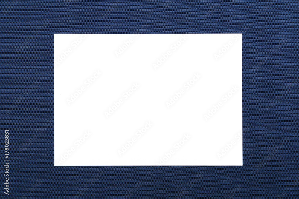 white blank card on navy blue background Stock Photo | Adobe Stock