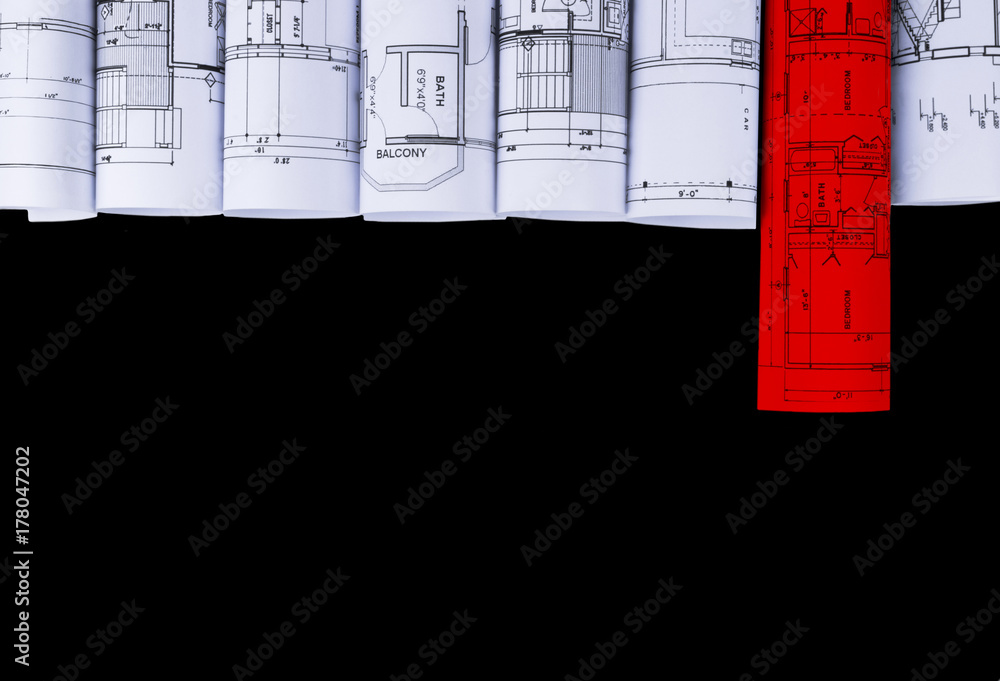 Architectural blueprints and blueprint rolls and a drawing instruments ...