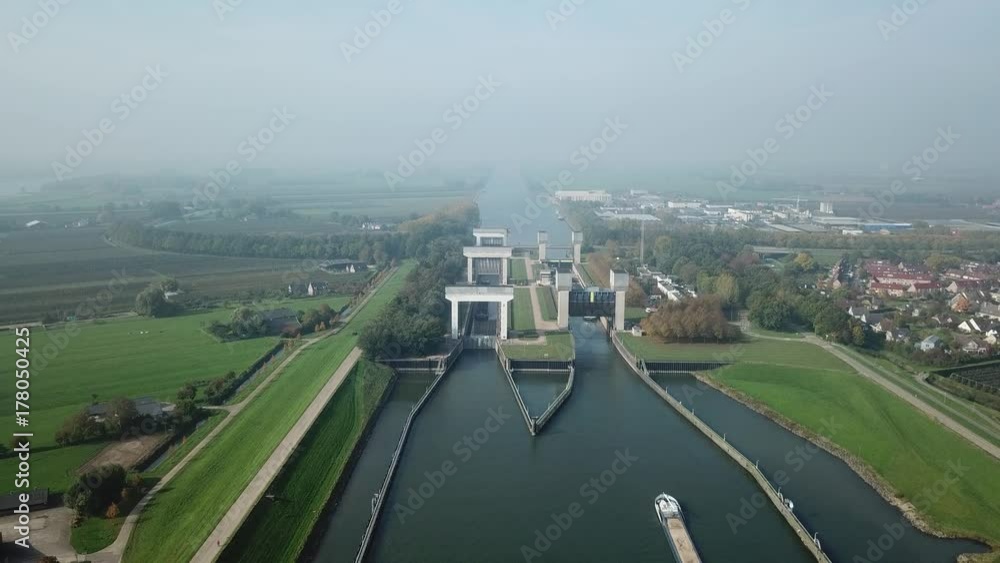 Aerial of a Boat entering the locks at the river Rhine in the ...
