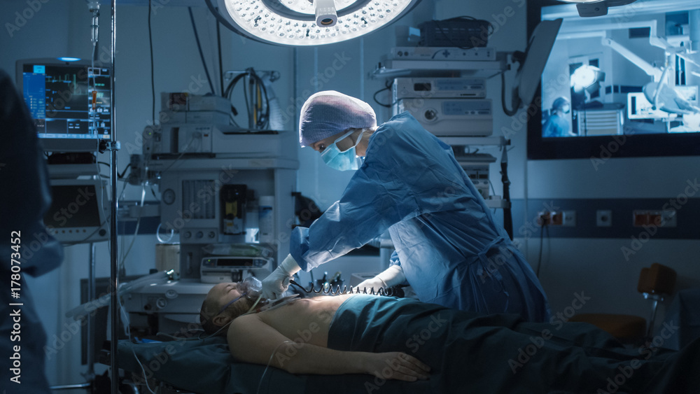 Medical Team Performing Surgical Operation in Modern Operating Room ...