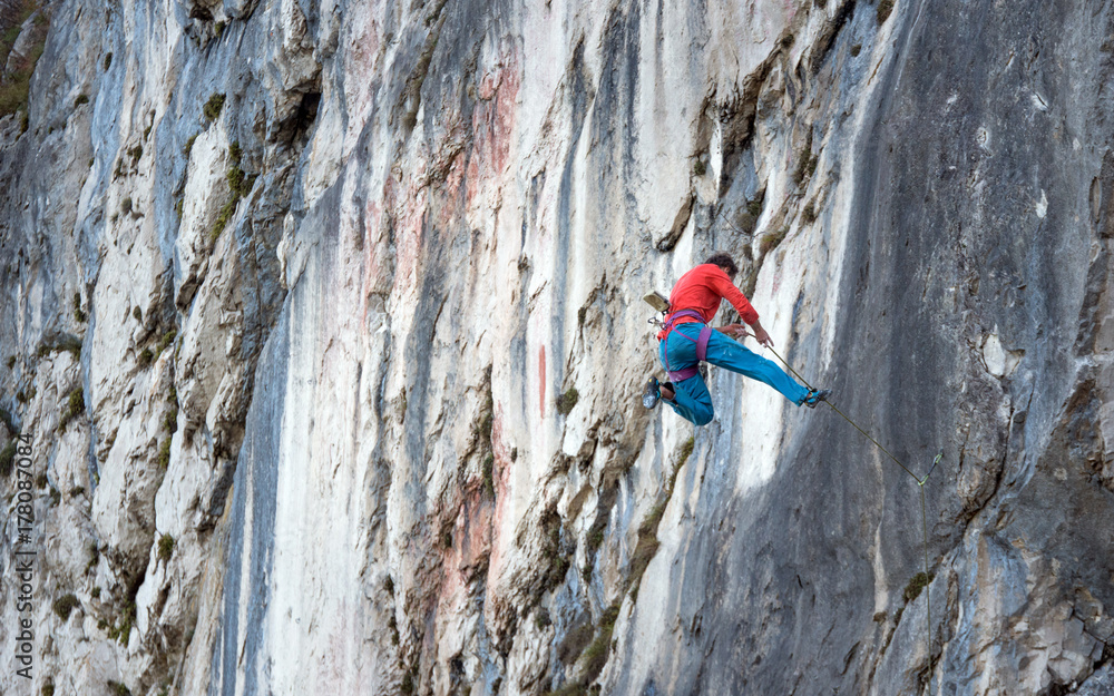 A mountain climber is hanging on the wall of the one of the Barmsteine ...