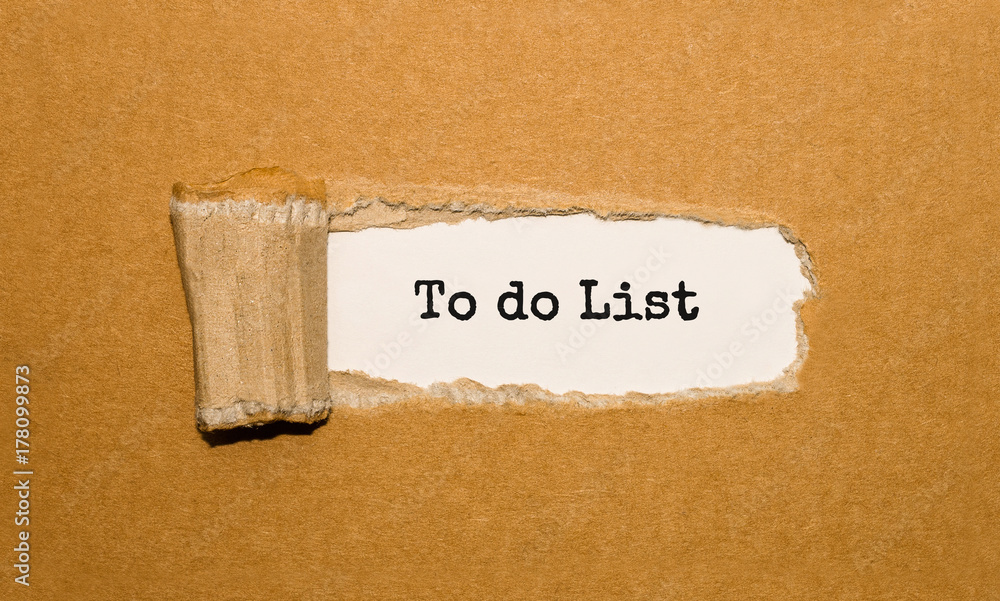 The text To do List appearing behind torn brown paper Stock Photo ...
