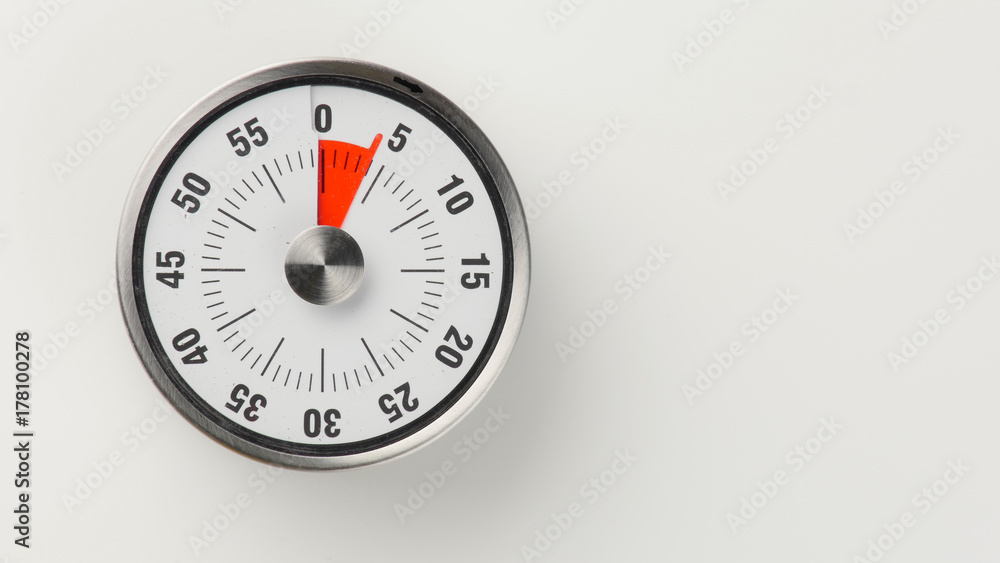 Vintage analog kitchen countdown timer with classical clock face and ...