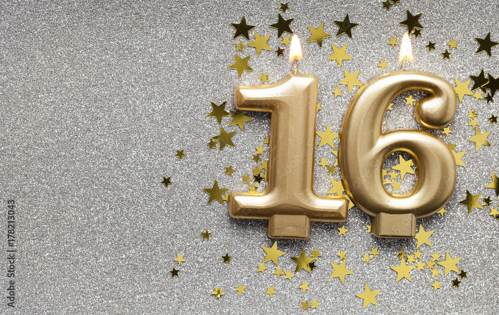 Number 16 gold celebration candle on star and glitter background Stock ...