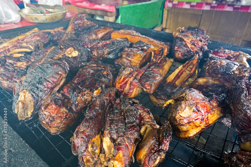 Smoked wild boar, a Sabah Borneo delicacy sold at the roadside along ...