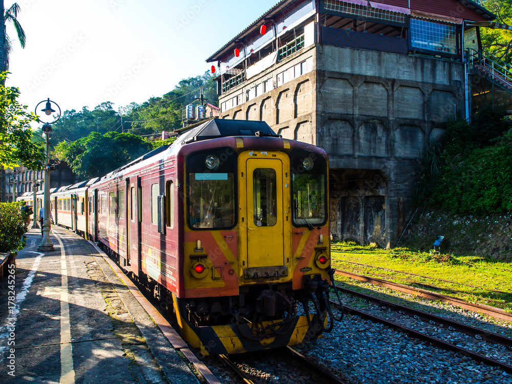 The old traditional train for sight seeing along the way toward Shifen ...