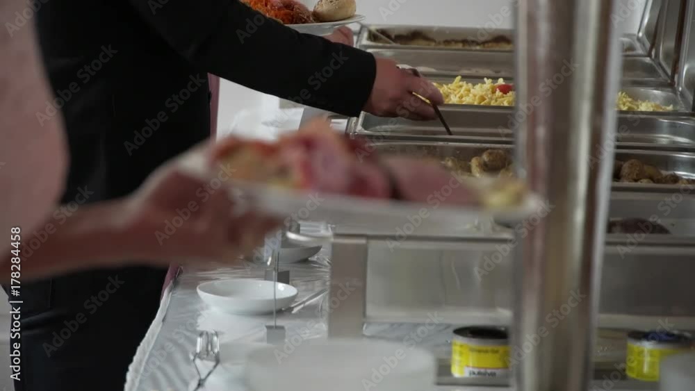 Group of people in all you can eat catering buffet food indoor in ...