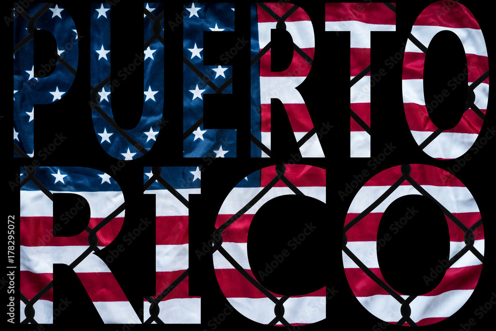 puerto rico hurricane letters with american flag in front of chain link ...