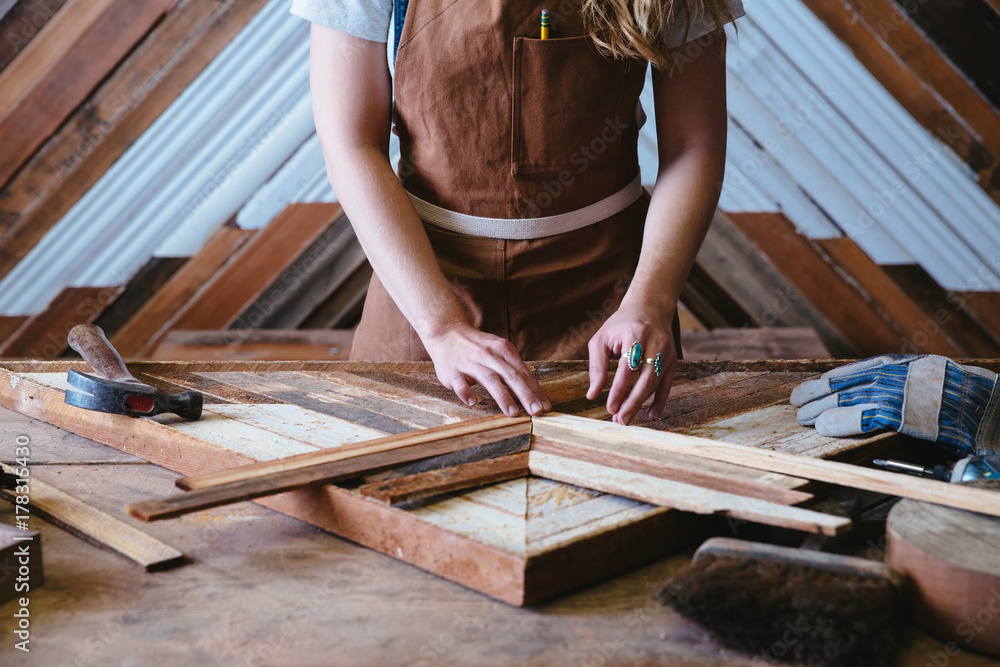 Wood making artist working in her studio Stock Photo | Adobe Stock
