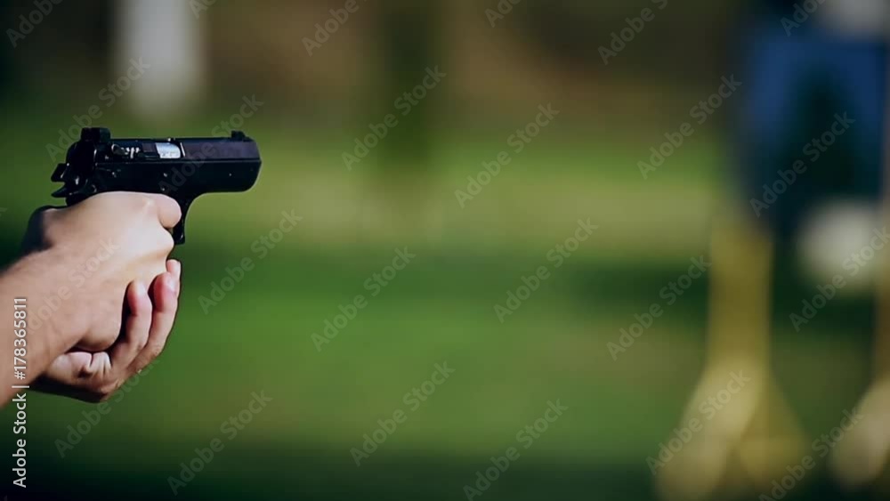 Outdoor shooting with a 9mm pistol in a shooting range Stock ビデオ ...