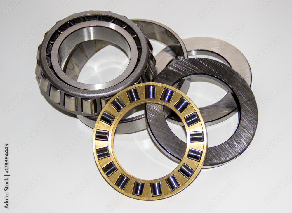 Exploded view of a thrust roller bearing and a tapered roller bearing ...