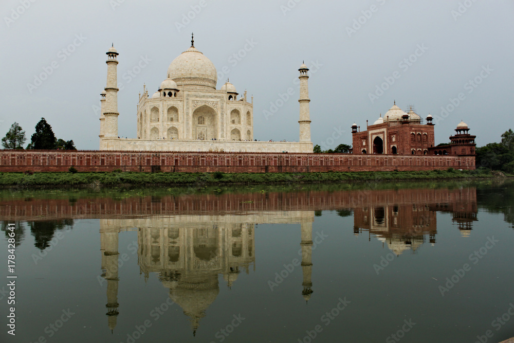 Taj Mahal white temple - Agra - with red brick wall around; photo with ...