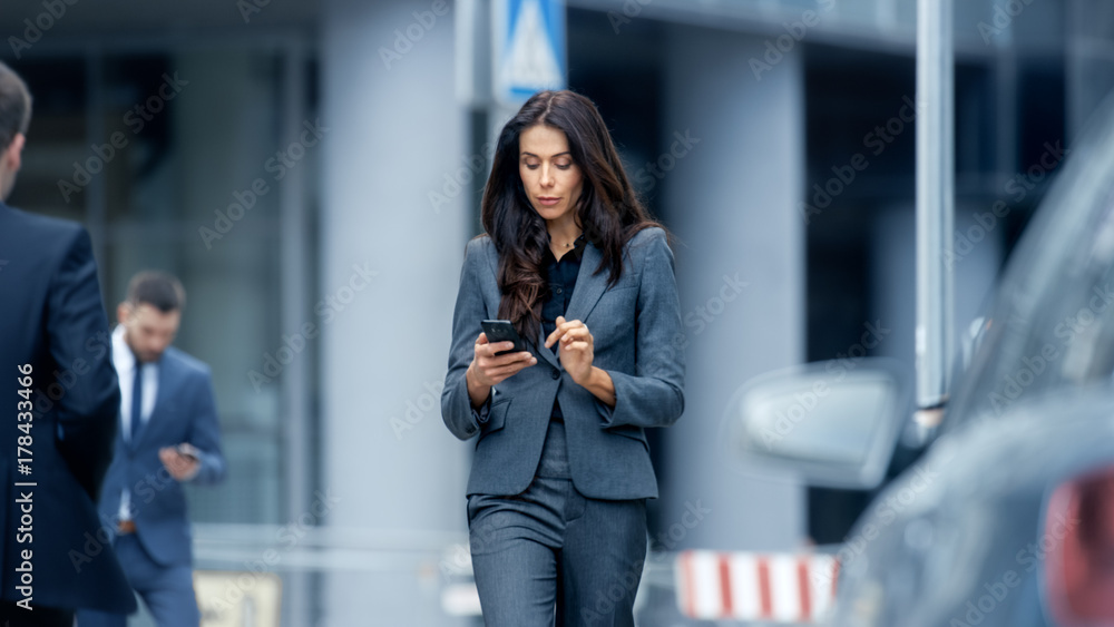 Business Woman in the Tailored Suit Walking on the Busy Big City Street ...