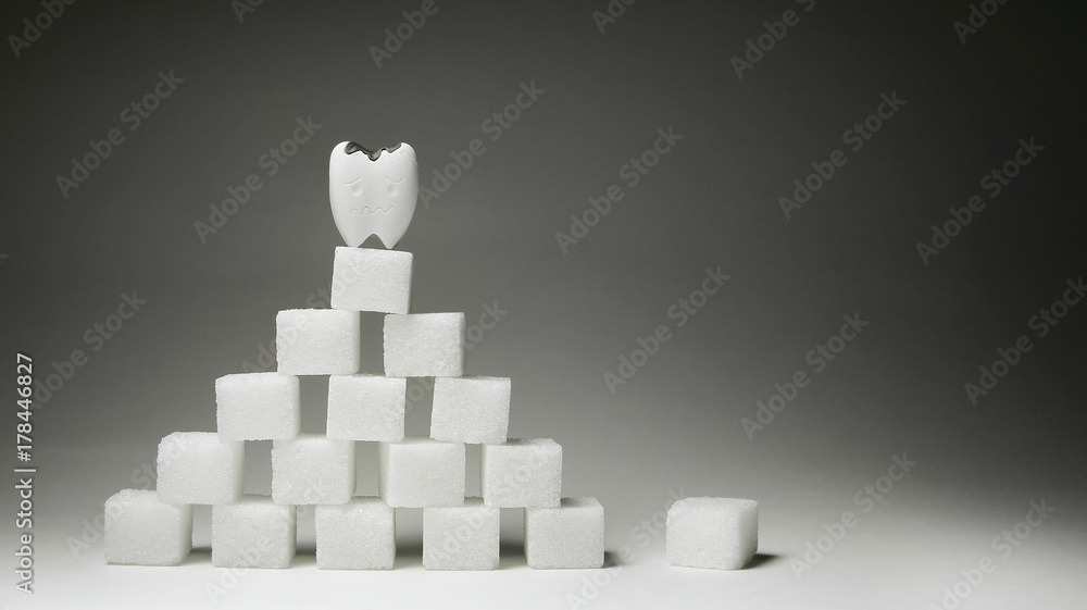 Pyramid of cubes sugar and Decayed teeth Model Standing on Top, If you ...