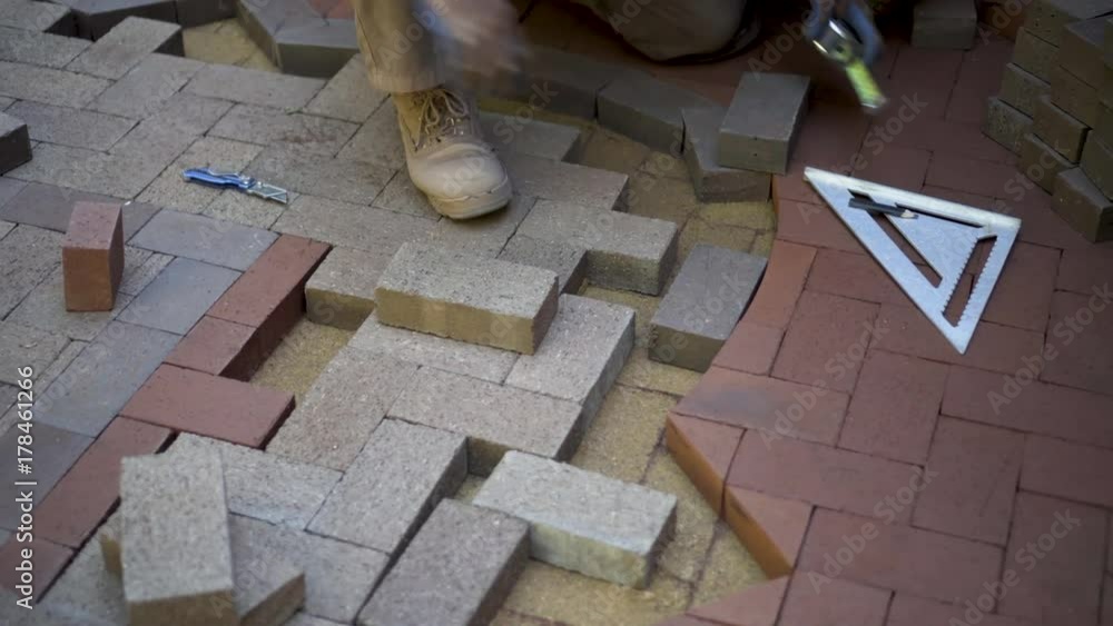 Measuring bricks and marking for cuts for a custom designed and cut ...
