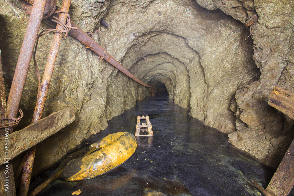 Underground mine shaft gold copper ore tunnel gallery with sulfur water ...